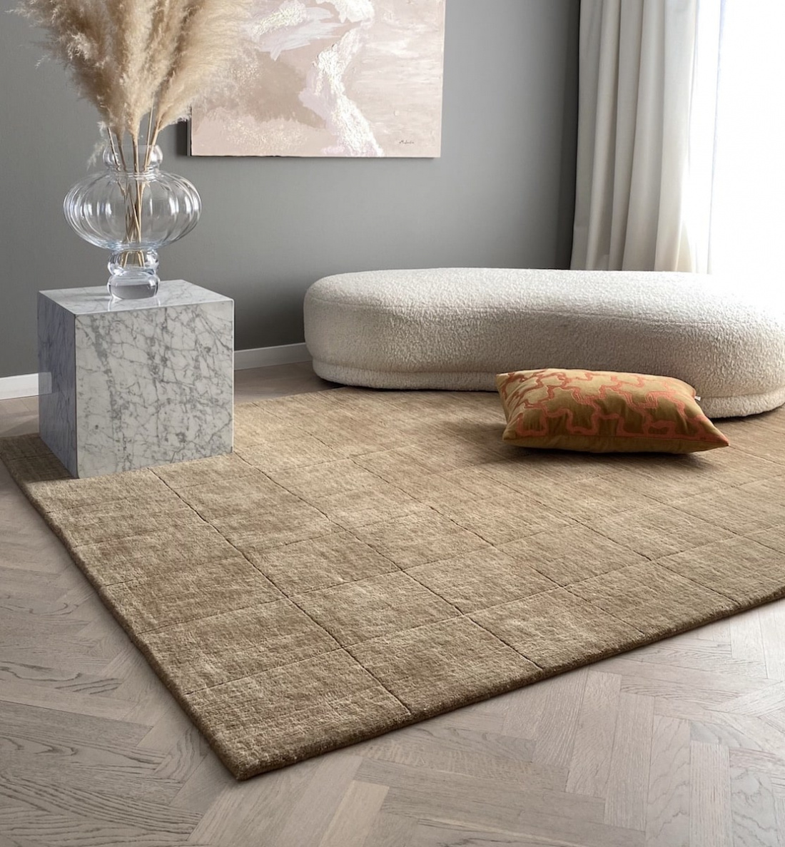 Inred hemma med en Beige Ullmatta | Chhatwal & Jonsson